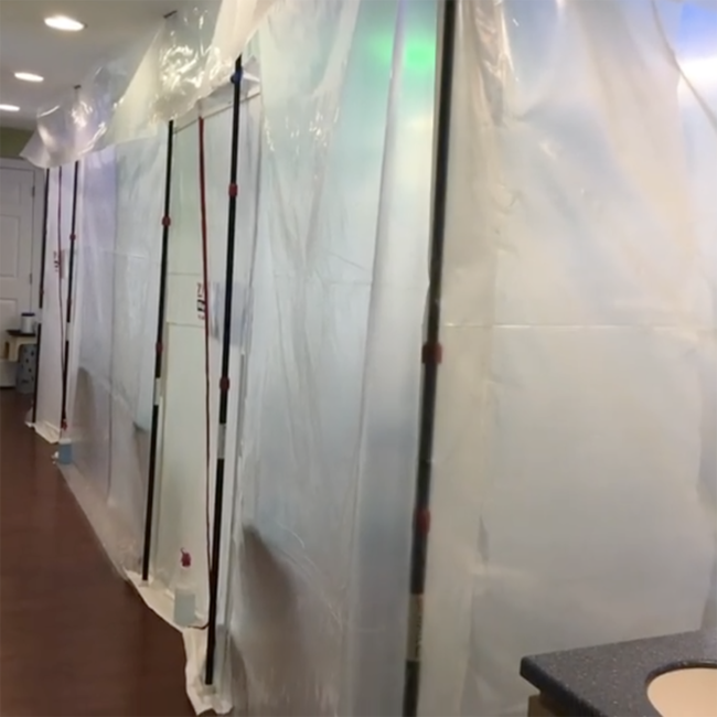 Isolation Room for Emergency Dental Care - ZipWall Dust Barrier System